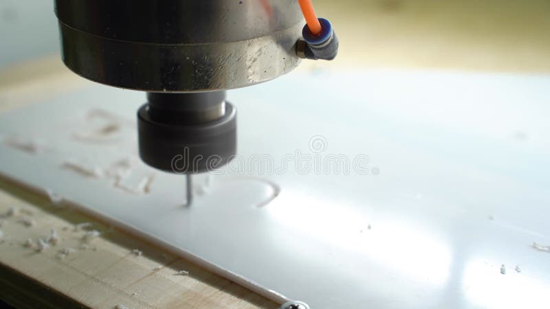 Milling Machine. the Milling Machine Operator Cuts Letters on Plastic ...