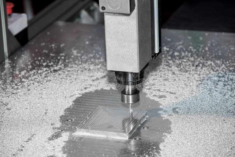 Milling a Metal Plate on a Vertically Milling Machine. Chips are ...