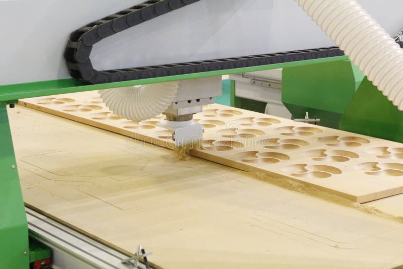 Milling a Wooden Board. CNC Woodworking Machine Stock Image - Image of ...