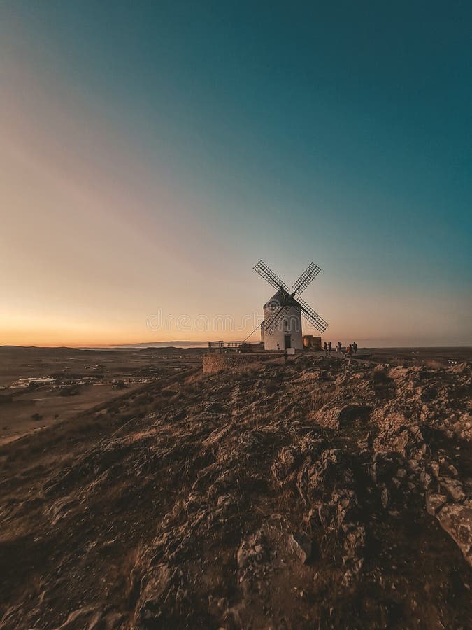 Mills in a sunset day stock image. Image of vehicle - 232435131