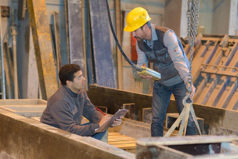 Millwrights Having a Conversation Stock Image - Image of machinist ...