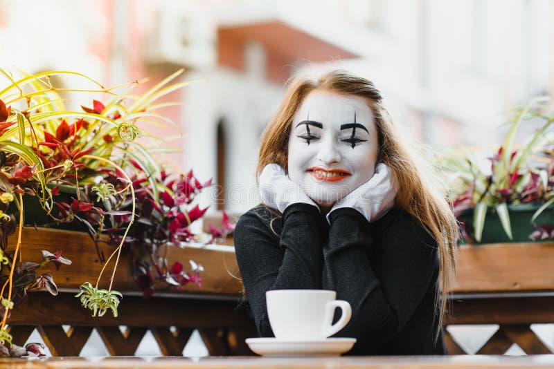 Mime Comedian Drinking Coffee. Girl Mime Drinks Coffee in Paris Stock ...