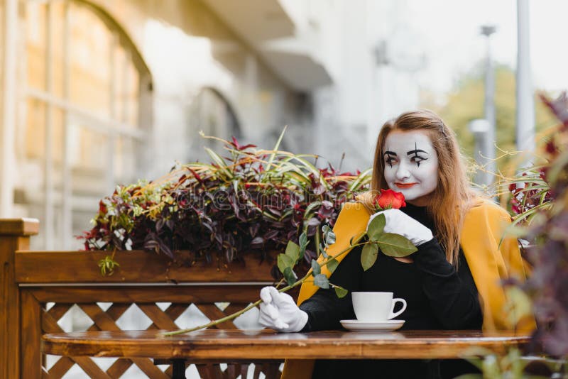 Mime Comedian Drinking Coffee. Girl Mime Drinks Coffee in Paris Stock ...