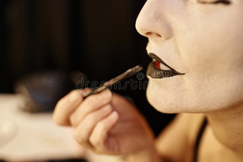 Mime Doing Makeup Backstage and Painting Black Lips Stock Photo - Image ...