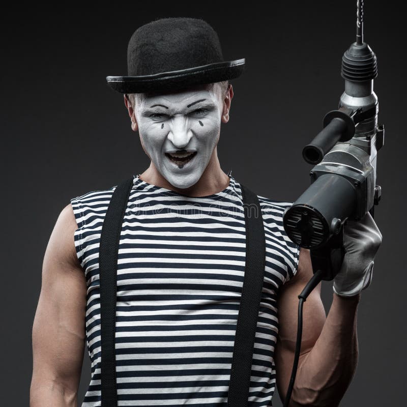 Mime with hammer drill stock photo. Image of brown, tool - 32980680
