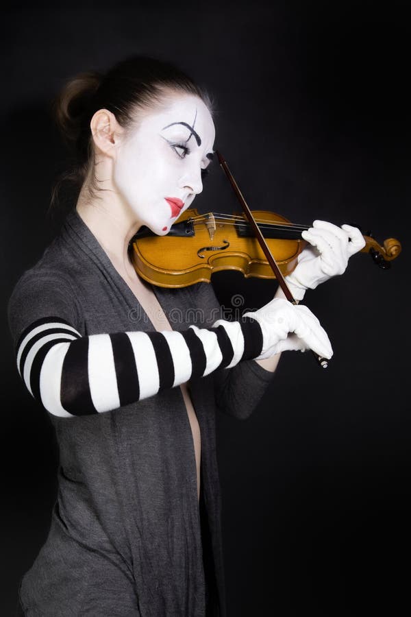 Mime playing the violin stock image. Image of violin - 17993627