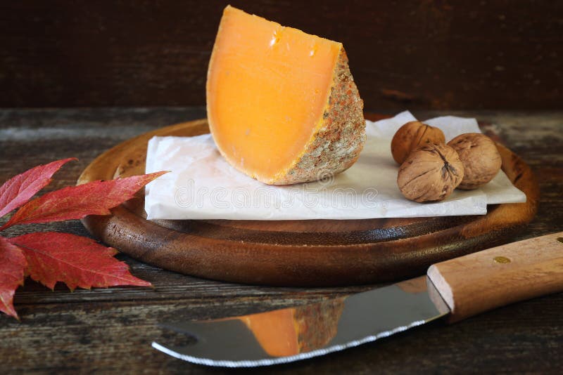 Mimolette Cheese and Walnuts Stock Photo - Image of cutting, nutrition ...