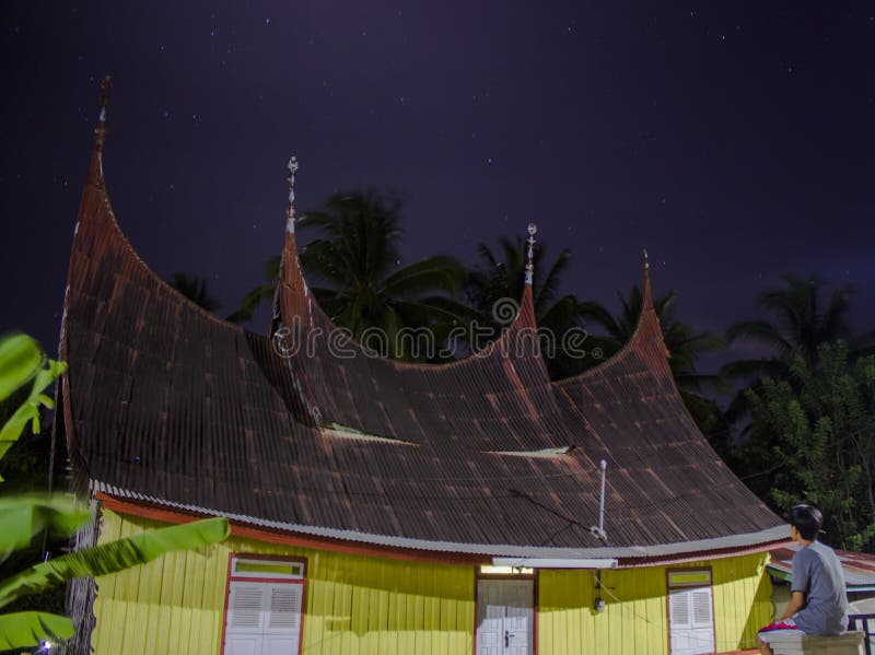 Minang Traditional House editorial image. Image of night - 106551395