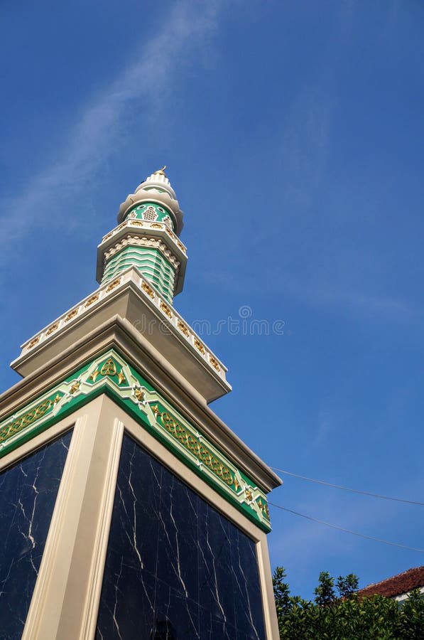 The Minaret of the Mosque is Towering with a Blue Sky Background. Stock ...