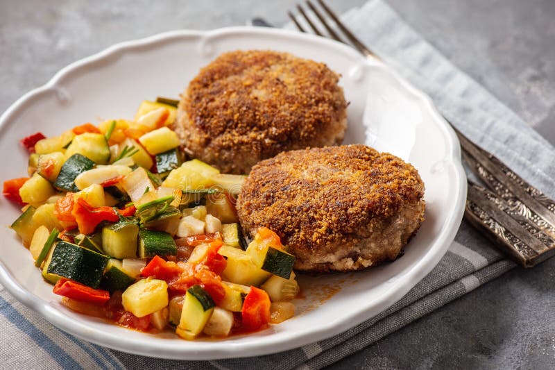 Minced Beef Cutlets Served with and Stewed Vegetables. Stock Photo ...