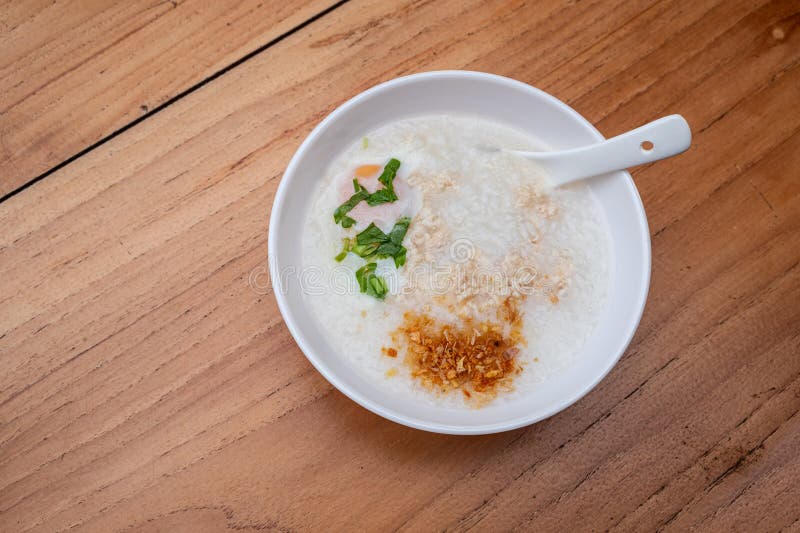 Minced Chicken Congee with a Soft-boiled Egg, a Very Popular Breakfast ...