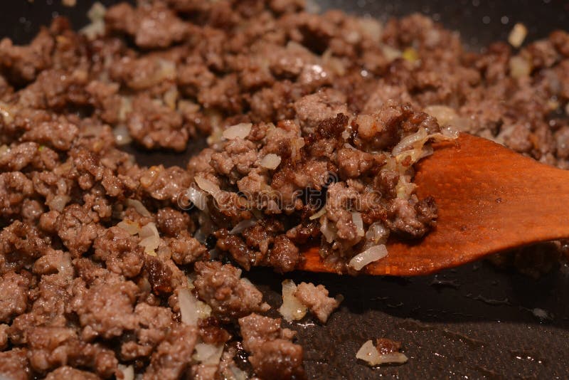 Minced meat is fried. stock photo. Image of ingredient - 88703680