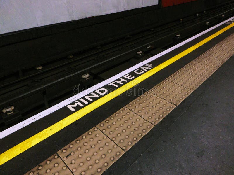 Mind the Gap Sign on a Platform Editorial Image - Image of railroad ...