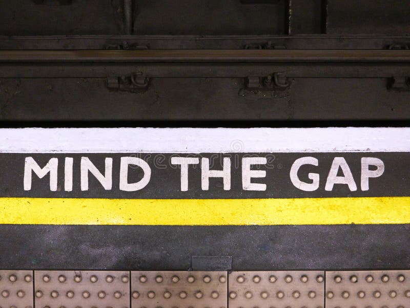 Mind the Gap Sign on a Platform Editorial Stock Photo - Image of ...