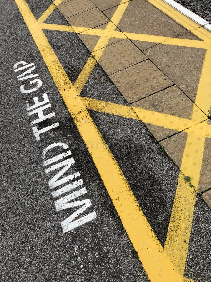 Mind the Gap Sign on a Platform Edge Editorial Image - Image of sign ...