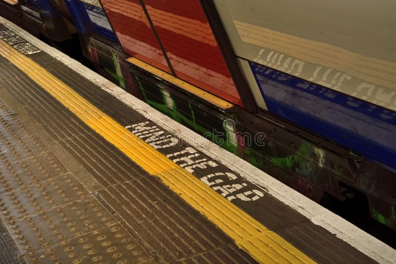 Mind the Gap Sign on Underground Platform. Editorial Stock Photo ...