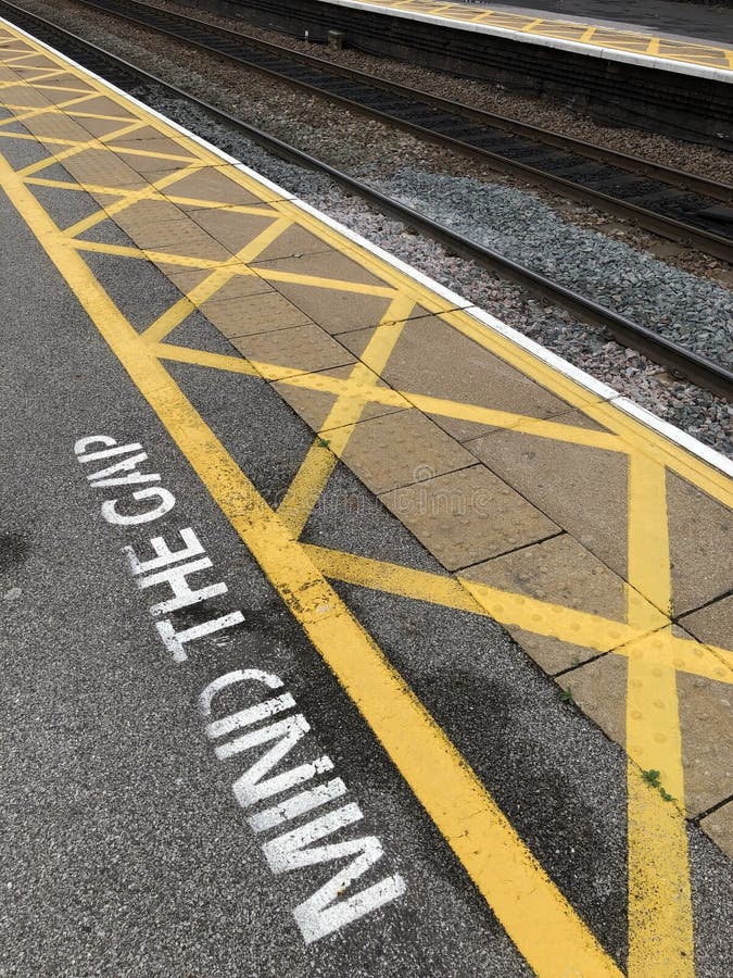 Mind the gap stock image. Image of kingdom, warning - 312049753