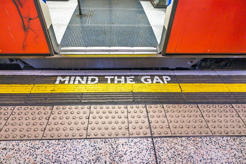 Mind the Gap Warning on London Underground Train Platform with Open ...