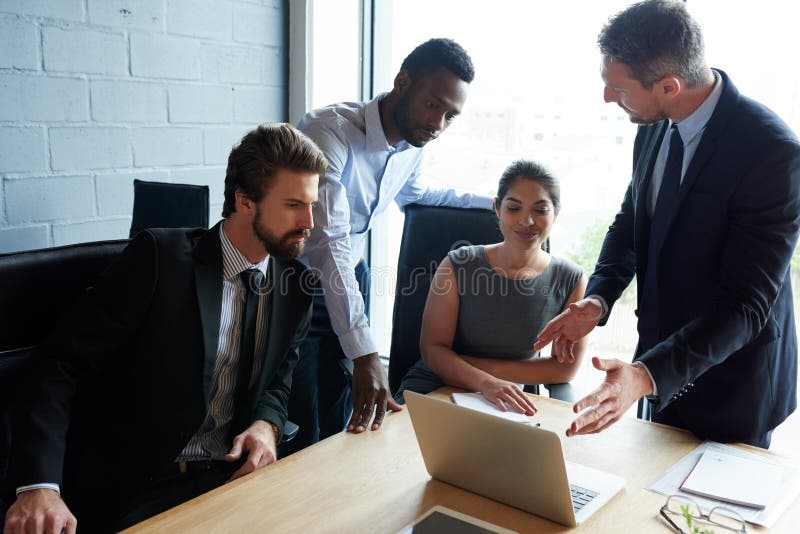 The Minds Behind the Company. a Group of Executives Having a Meeting in ...