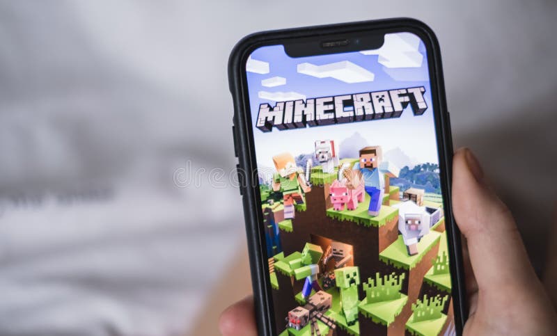 Minecraft Game on the IPhone Screen in Hand. Editorial Photo - Image of ...