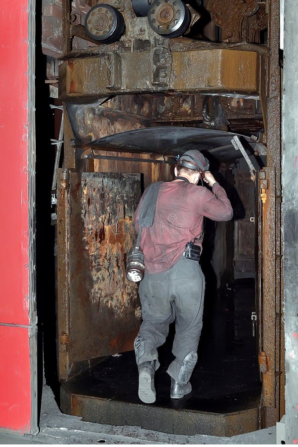 Miner Down in the Lift Under the Ground Stock Photo - Image of builder ...