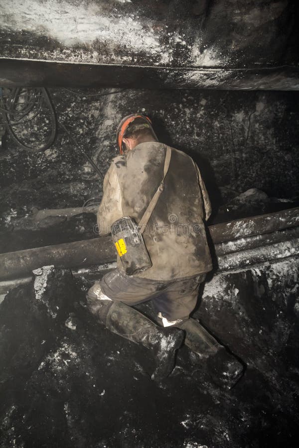 Miner in a mine editorial image. Image of coveralls, human - 74821395