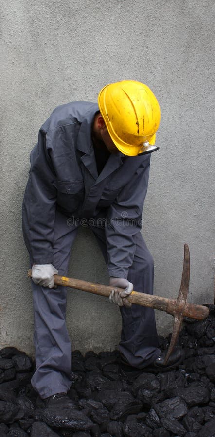 Miner using a pickaxe stock image. Image of background - 58990869