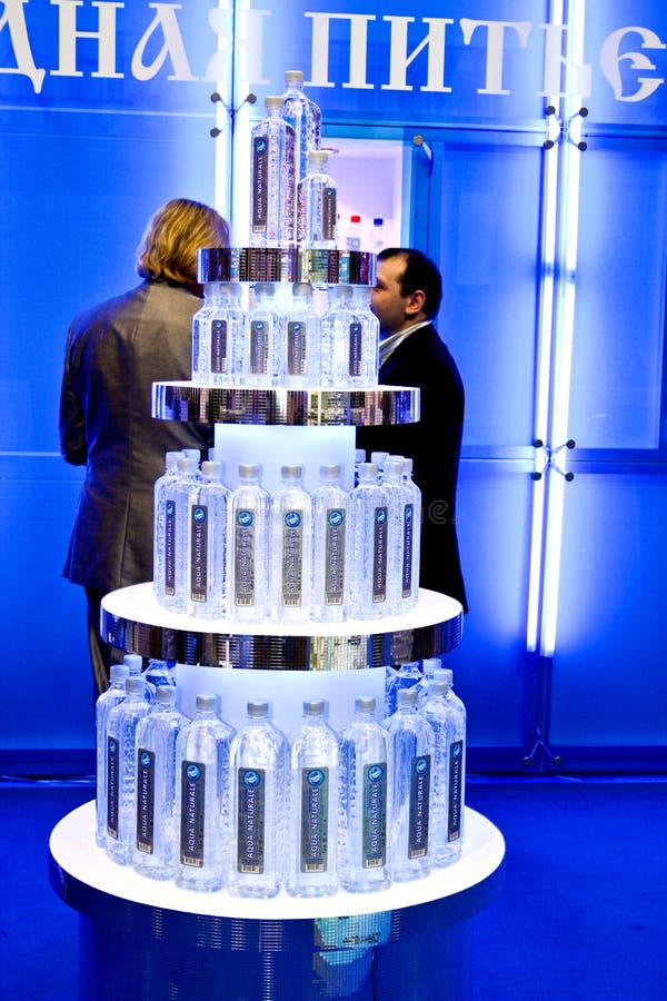 Mineral water bottle rack editorial photography. Image of blue - 24620792