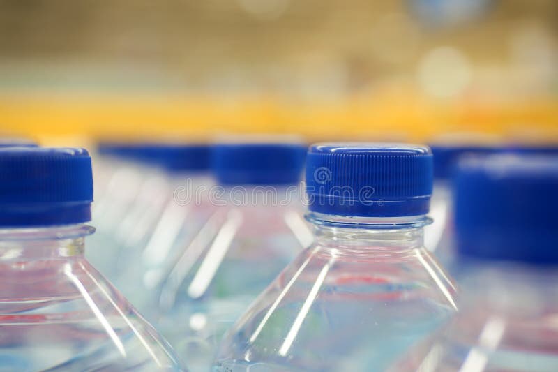 Mineral Water Bottle in a Row Stock Photo - Image of bottle, pure ...