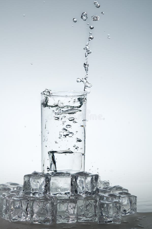 Mineral Water Splashing Out from Glass Stock Image - Image of cube ...
