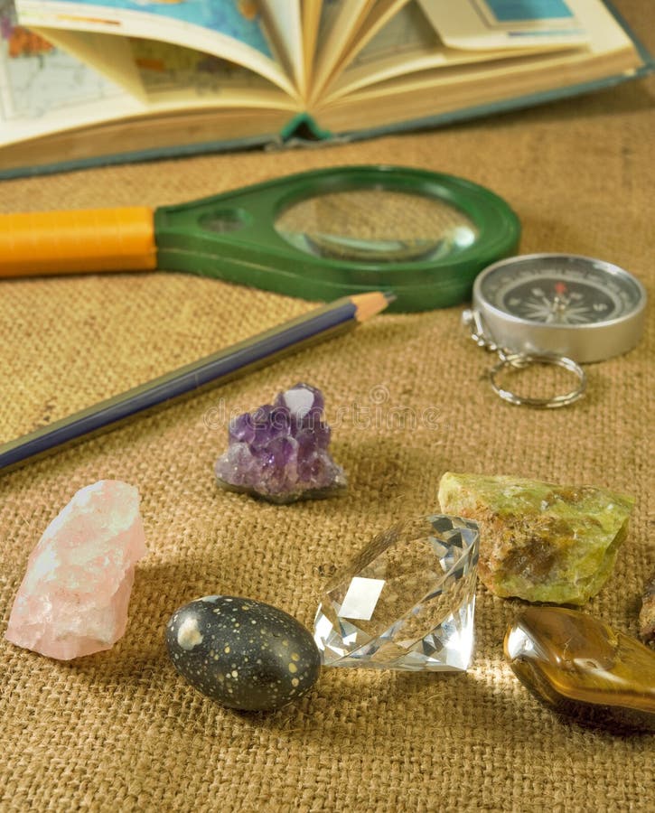 Minerals, Atlas, Magnifier, Pencil and Compass Stock Photo - Image of ...