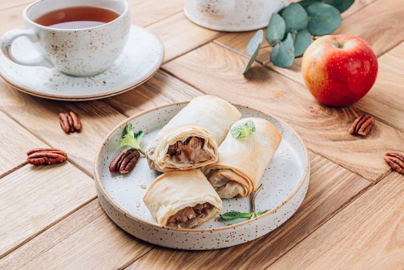 Mini Apple Strudel with Pecans and Mint on Wooden Table. Viennese ...