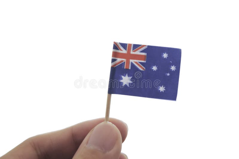 Mini Australian National Flag Holding by Fingers Stock Photo - Image of ...