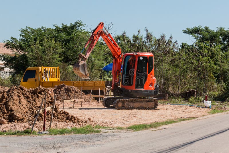 Mini backhoe stock image. Image of industry, digger, loader - 86077525