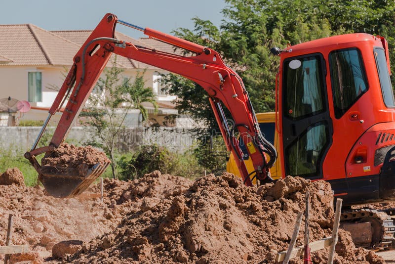 Mini backhoe stock image. Image of excavation, loader - 86077917