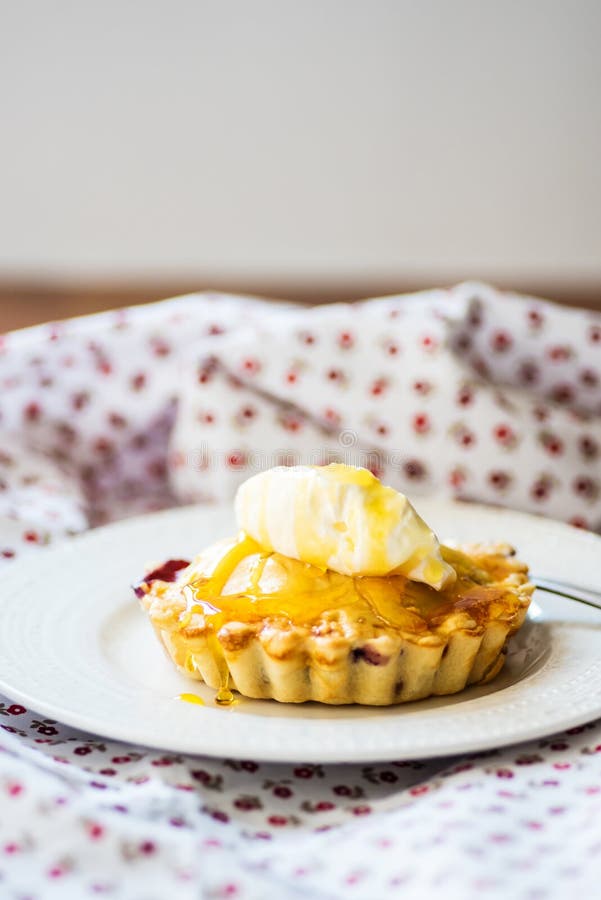 Mini Berries Pie with Fresh Cream and Golden Syrup Stock Photo - Image ...