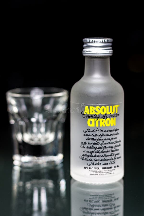 A Mini Bottle of Absolut Citron Vodka with a Glass Editorial Image ...