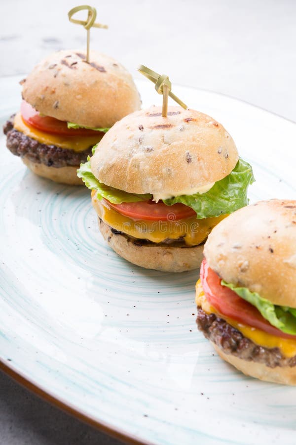 Mini Burgers Served for Dinner Stock Image - Image of macro, hamburger ...