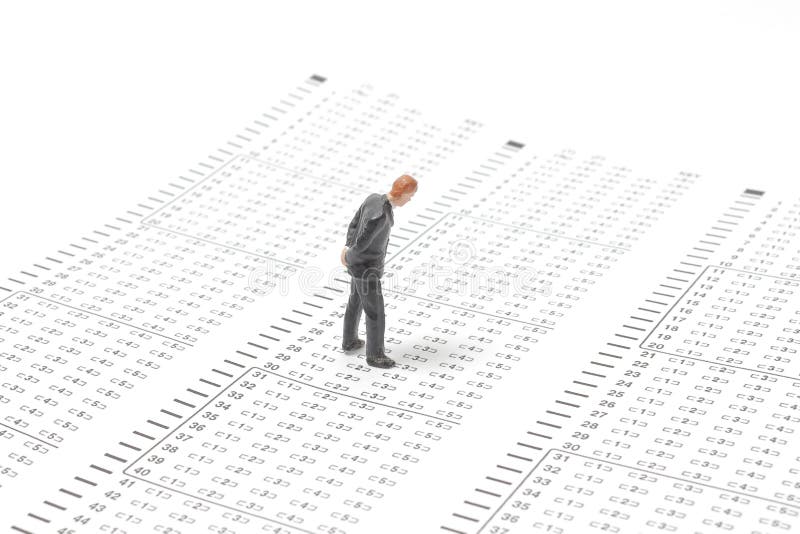 Mini Business Figure on Multiple Choice Answer Paper Stock Photo ...