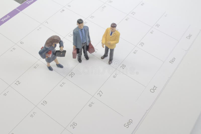 A Mini Business Man Figure on the Calendar Stock Photo - Image of diary ...