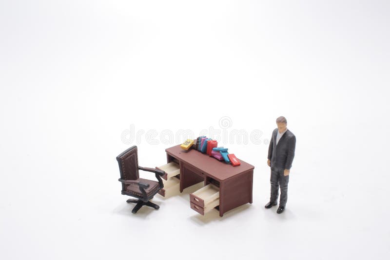 A Mini of Businessman Working on the Desk Stock Photo - Image of ...