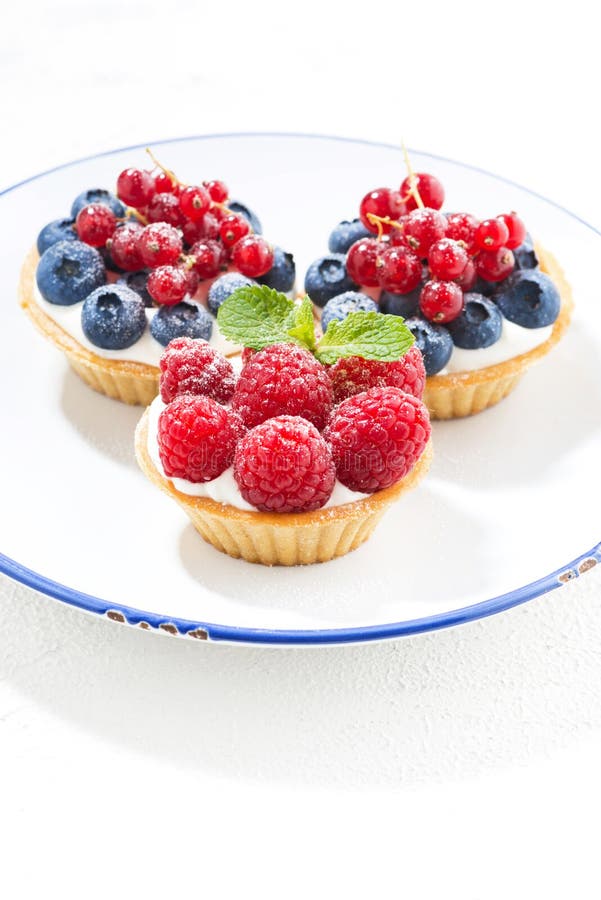 Mini Cakes with Cream and Berries on Plate Stock Image - Image of ...
