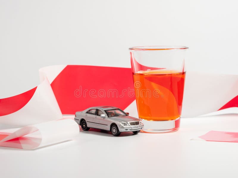 Mini Car Accident. Alcohol and a Toy Car on a Light Background Stock ...
