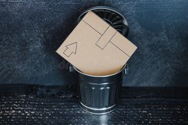 Mini Cardboard Box Going into a Garbage Bin Stock Photo - Image of ...