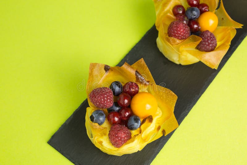 Mini Cheesecakes with Filo Pastry and Berries Stock Image - Image of ...