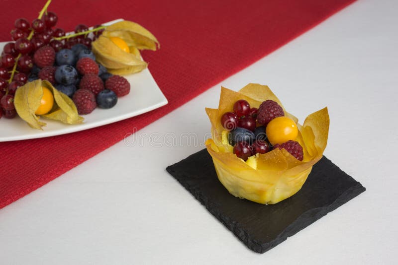 Mini Cheesecakes with Filo Pastry and Berries Stock Photo - Image of ...