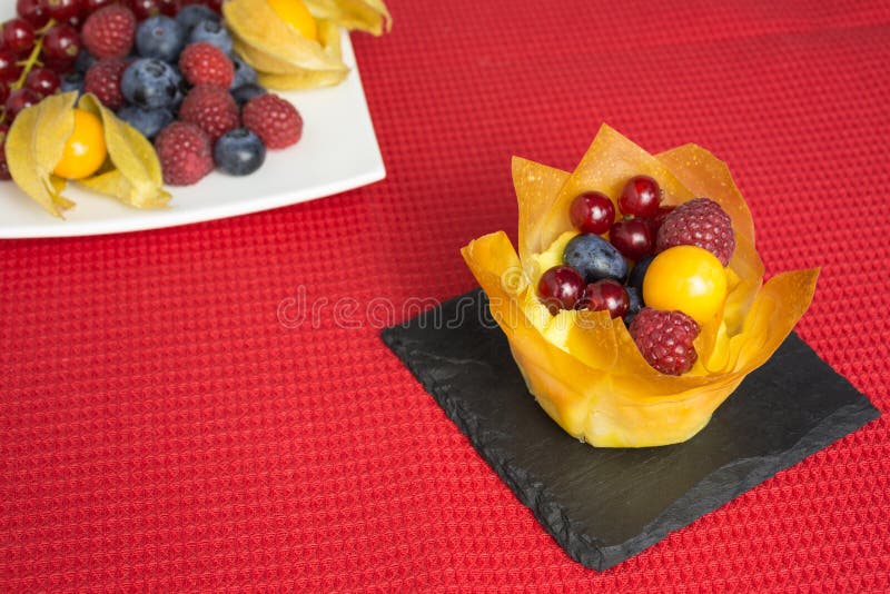 Mini Cheesecakes with Filo Pastry and Berries Stock Image - Image of ...