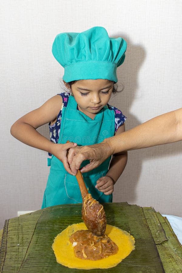 Mini Chef Preparing Typical Venezuelan Hallacas Stock Photo - Image of ...