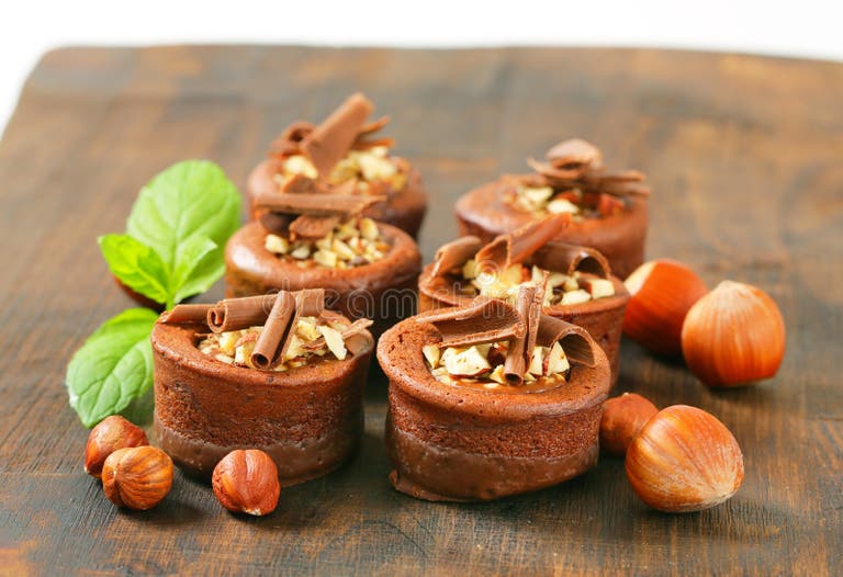 Mini Chocolate Hazelnut Cakes Stock Photo - Image of curls ...