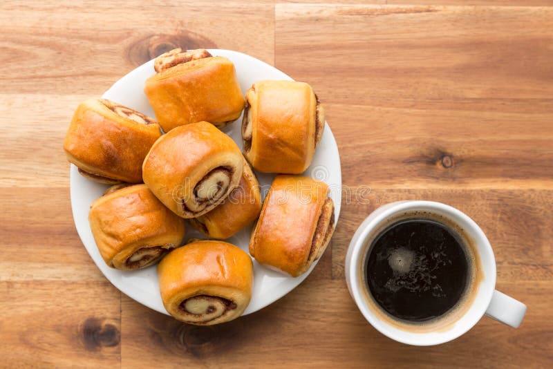 Mini Cinnamon Buns and Coffee. Stock Photo - Image of overhead, food ...